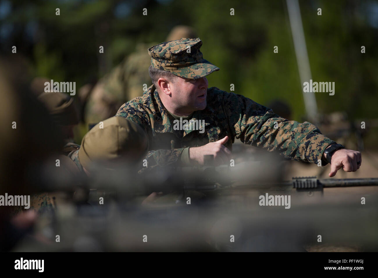 U.S. Marine Staff Sgt. David P. Mortensen, a Scout Sniper Instructor ...