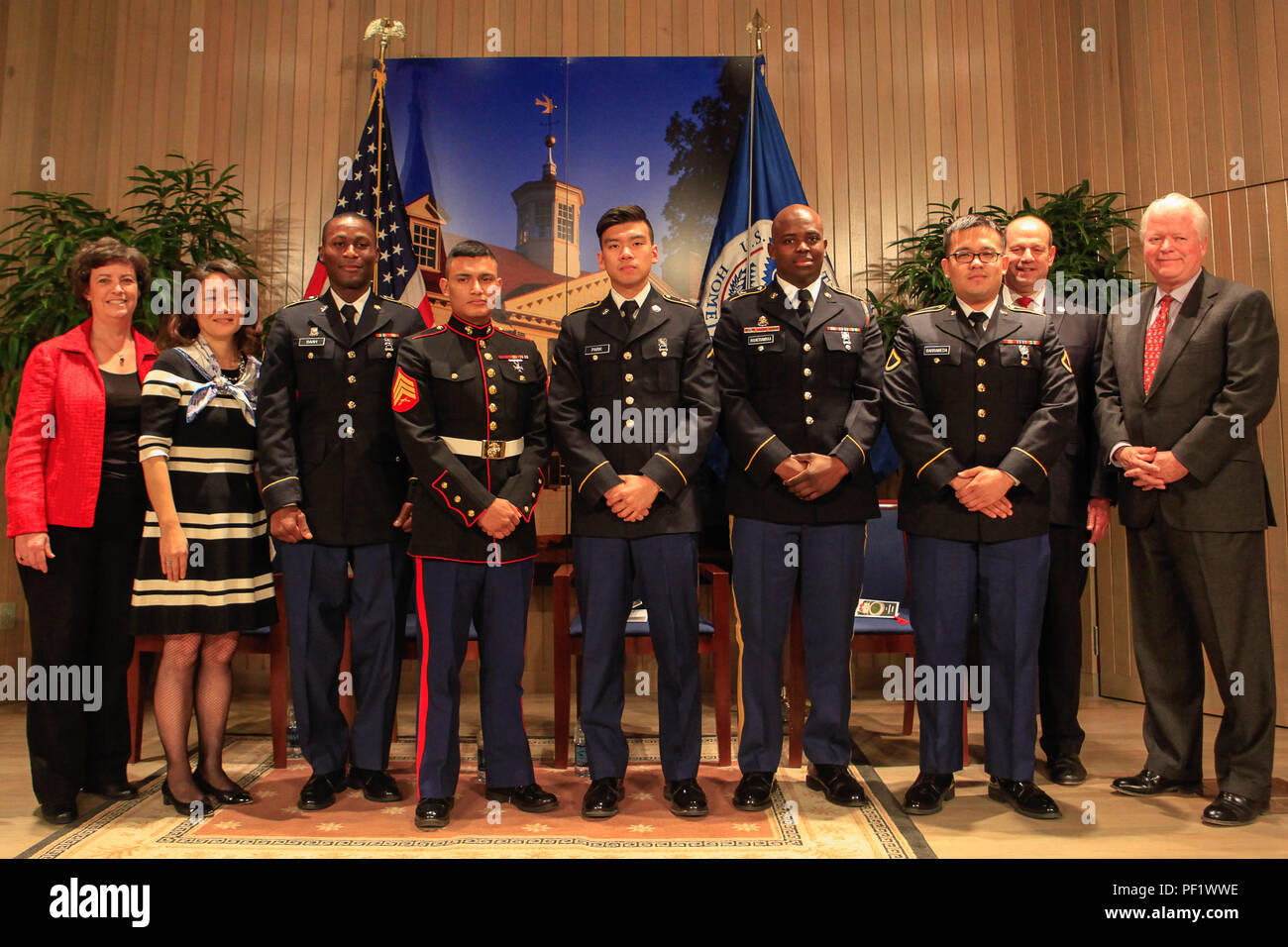 Service members and representatives from the Department of Homeland ...
