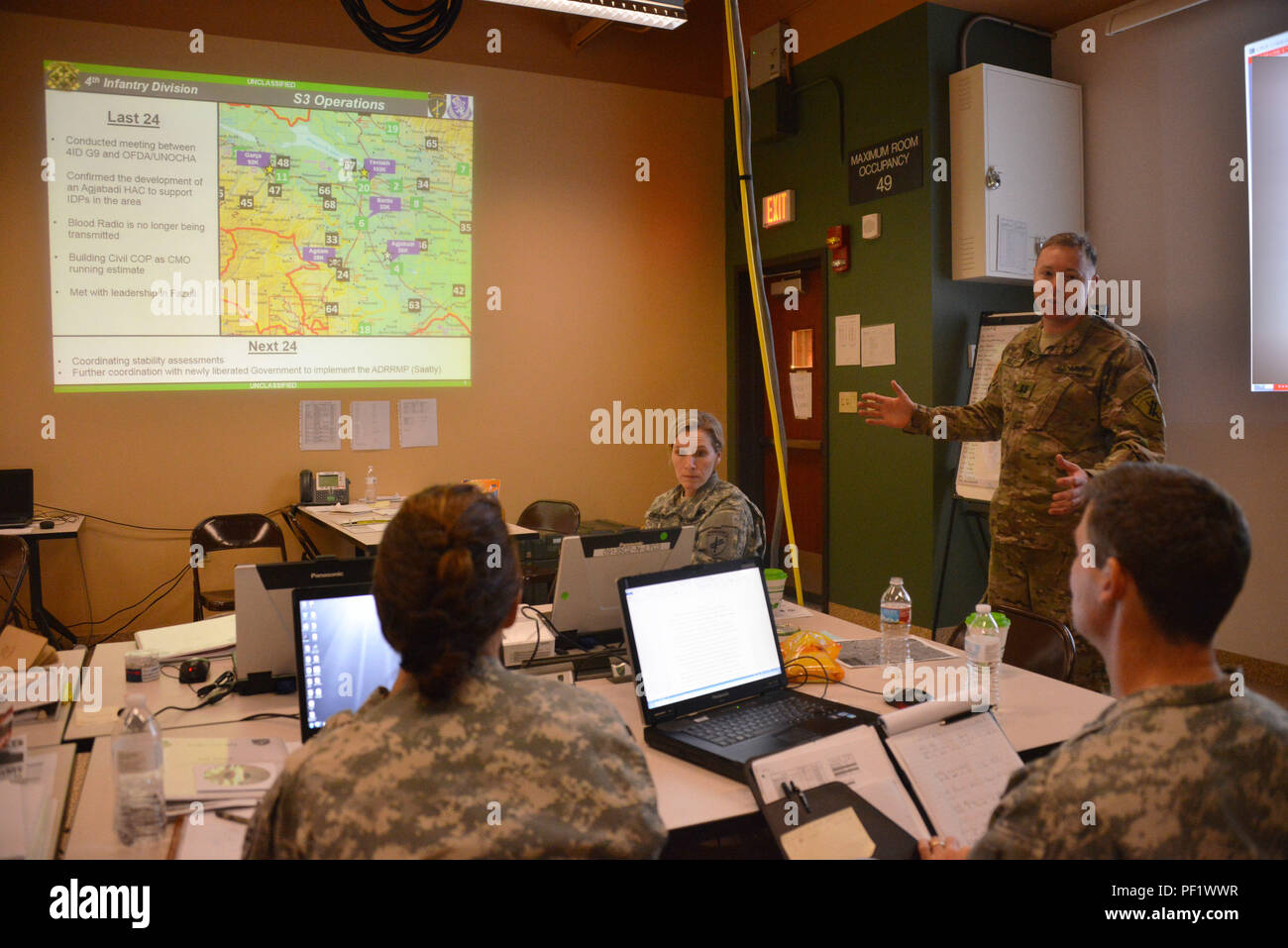 Capt. Benjamin Riley, a civil affairs operations officer with the 418th ...