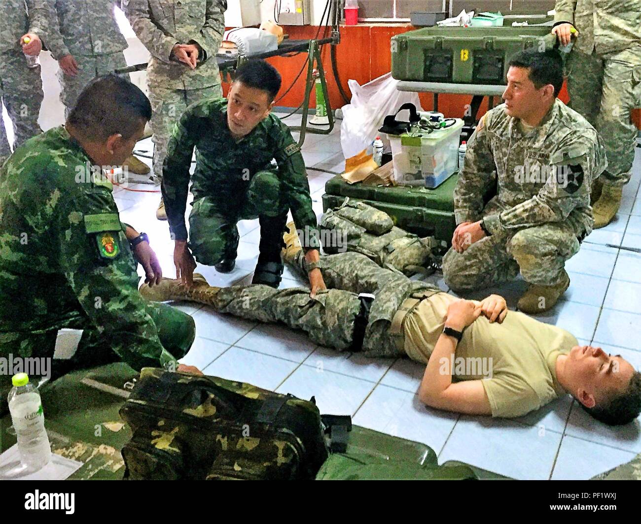 Pfc. Pablo Rivera (right) and Pfc. Steffan Lowery (simulated patient ...
