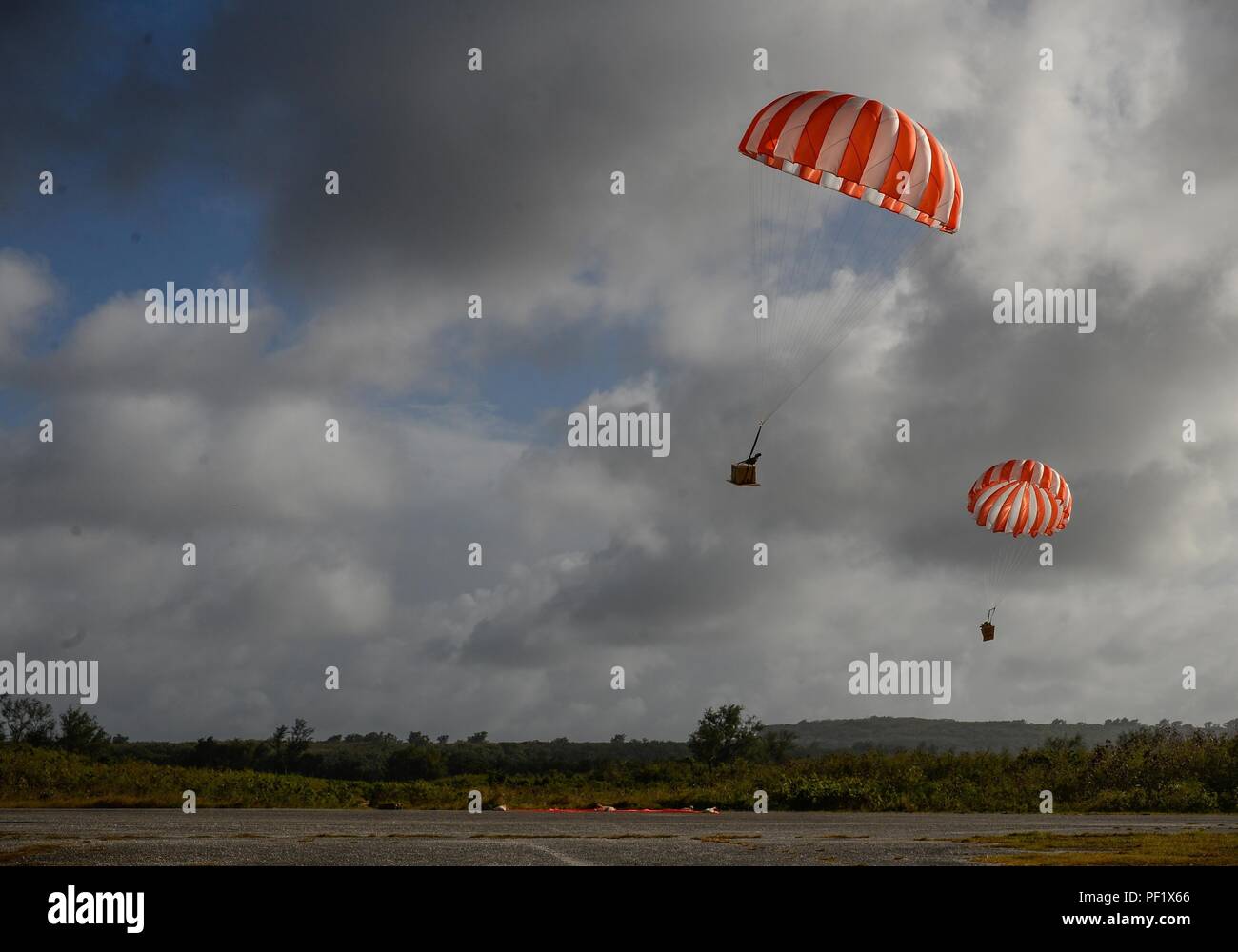 Airdrop packages land on the drop zone after a Japan Air Self-Defense ...