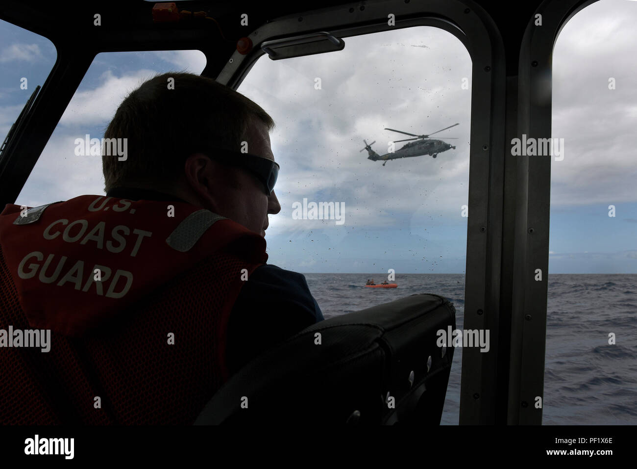 U.S. Coast Guard Engineering Petty Officer Ralph Barsloue, a machinery ...