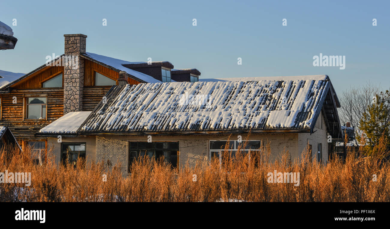 Rural house covered by snow at mountain village in Northernmost China ...