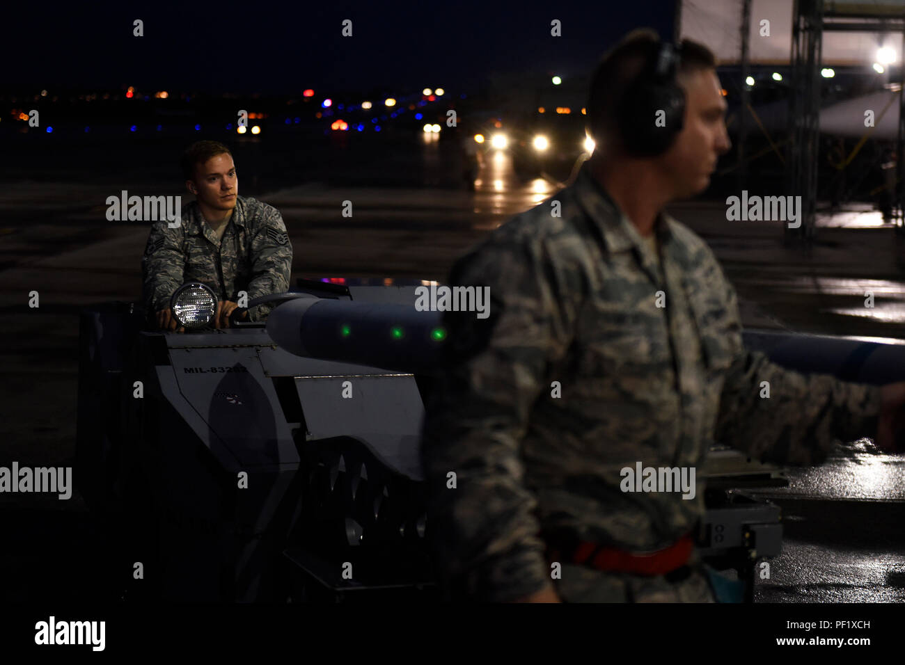 U.S. Air Force Staff Sgt. Devon Childress, a weapons load technician ...