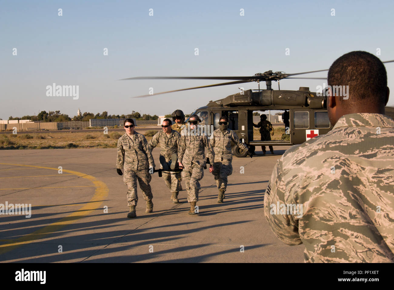 Airmen of the 386th Expeditionary Medical Group practice unloading a ...