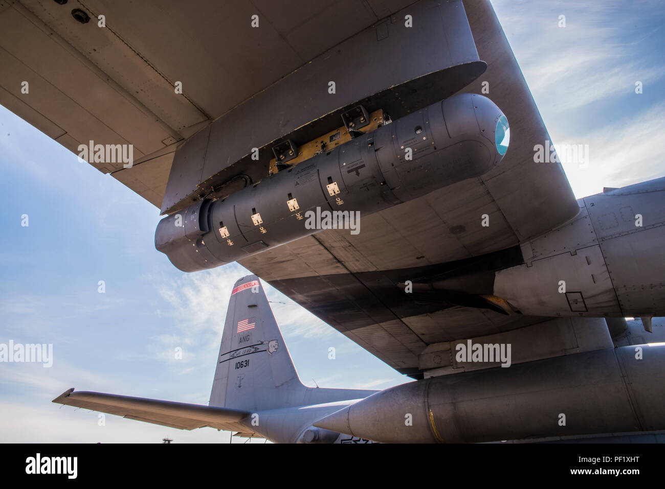 A 189th Airlift Wing C-130H is mounted with a Northrop Grumman LITENING ...