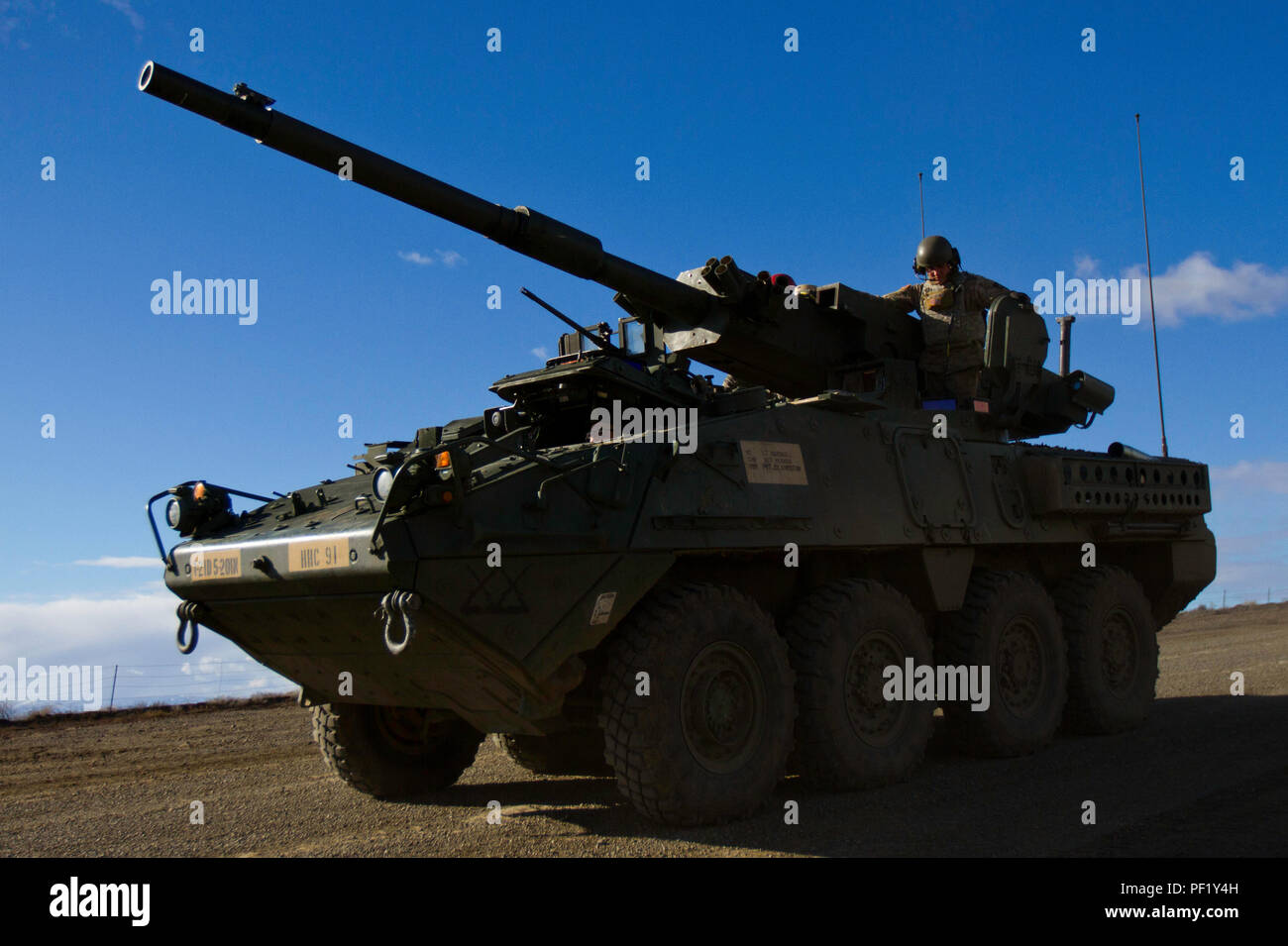 Spc. Luc Peterson, a gunner with Headquarter and Headquarters Company ...