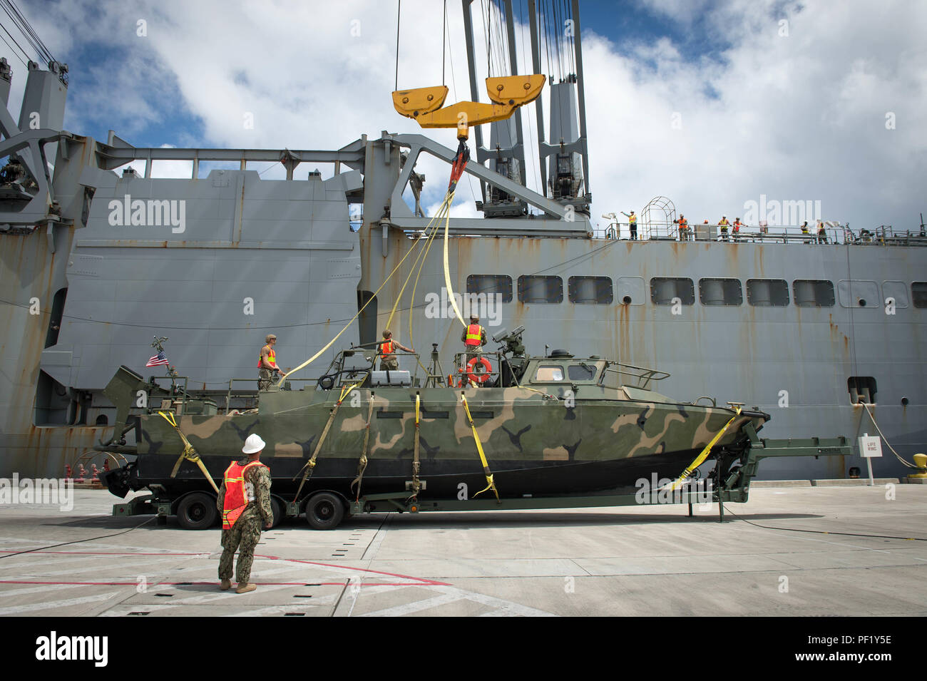 Sailors, assigned to Coastal Riverine Squadron 3 (CRS 3), embark a Riverine Command Boat (RCB ...