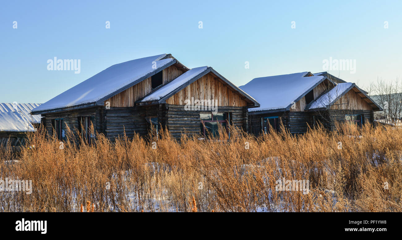 Rural house covered by snow at mountain village in Northernmost China ...