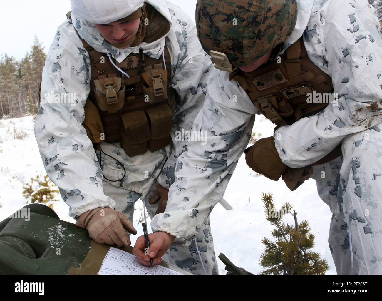 Cpl. Brennan Ullrich (left), and Cpl. Robert Maharrey, cannoneers with ...