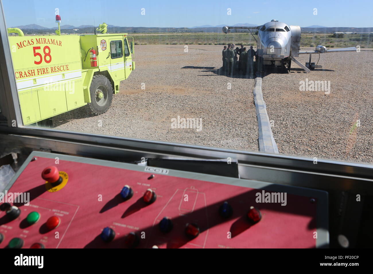 Aircraft Rescue and Firefighting Marines gather around the Mobile ...