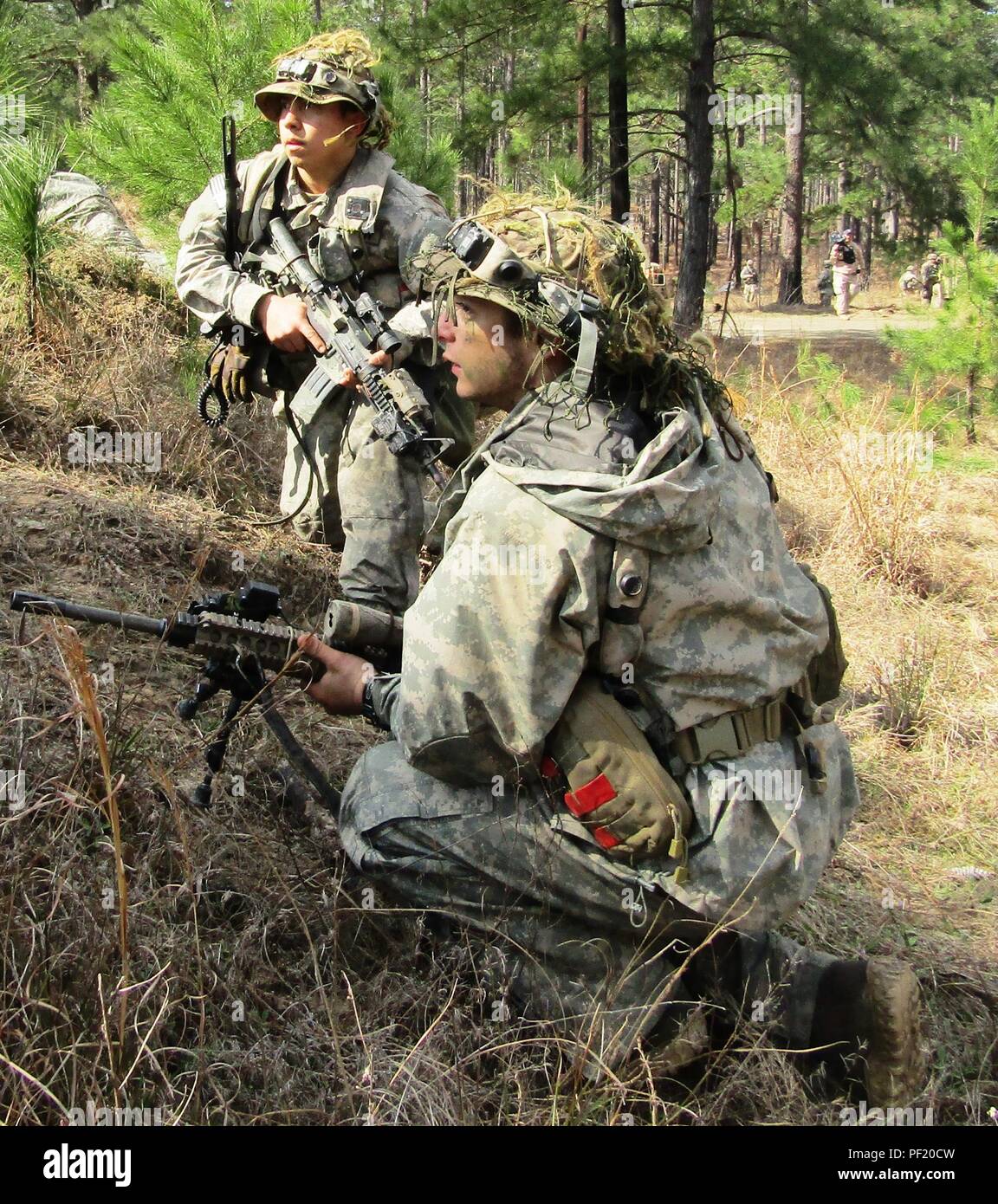Spc. Enrico Byron, from Sacramento, Calif., and Spc. Nicholas Gonzales ...