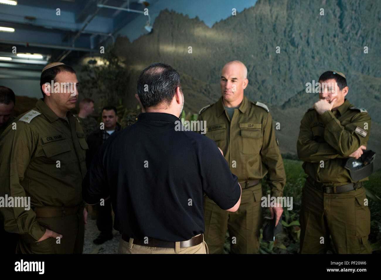 Mr. Vince Soto, center, infantry immersive training (IIT) contractor ...