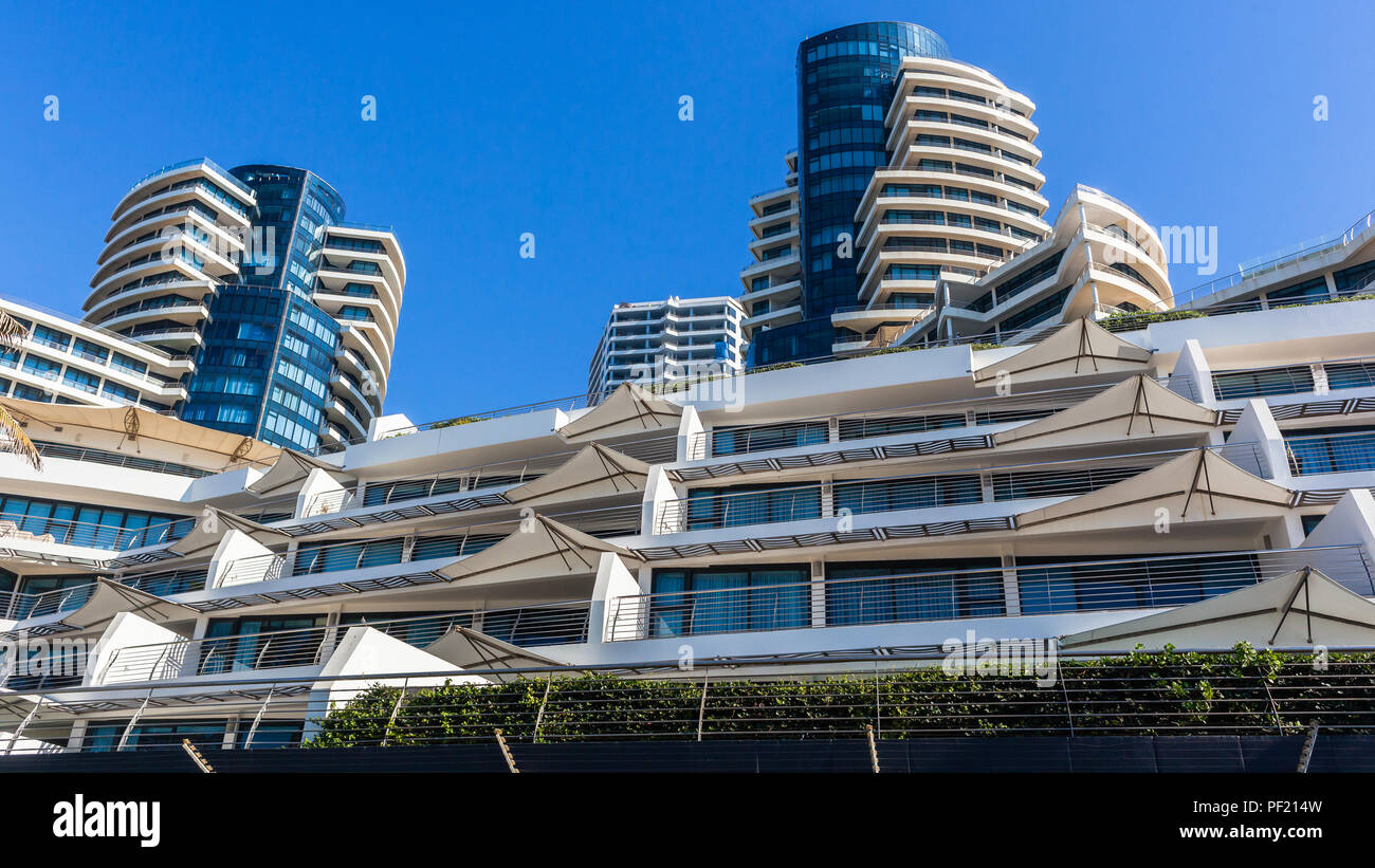 Tall Modern Building apartments closeup section floors design into blue ...