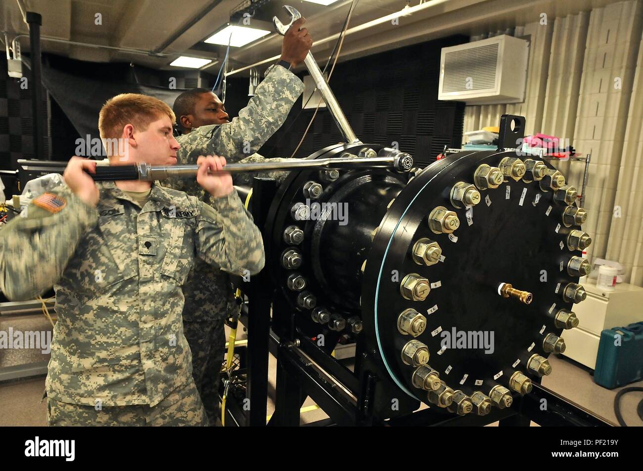 Spc. Daniel Oladejo (right) and Spc. Peter Johnson, biomedical science ...
