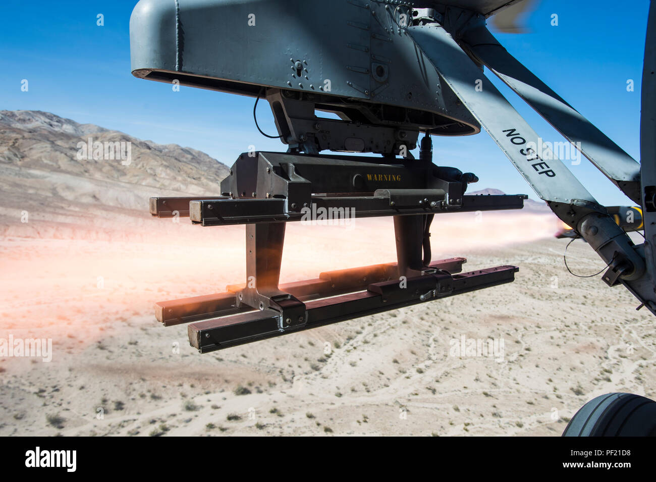 160224-N-CW570-0399 An AGM-114B Hellfire missile is launched from an MH ...