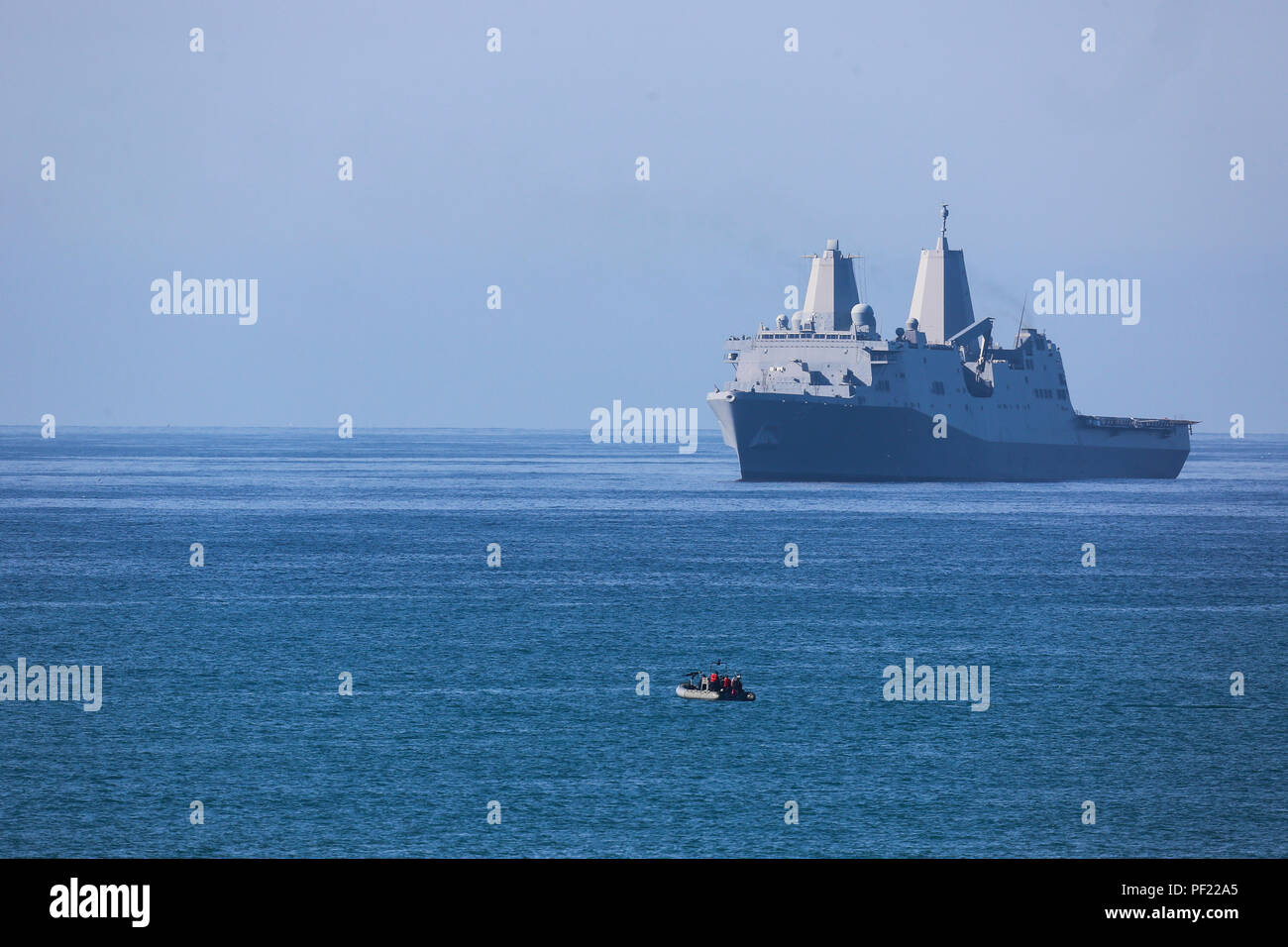 The USS Somerset (LPD 25) positions itself off the shore of Marine ...