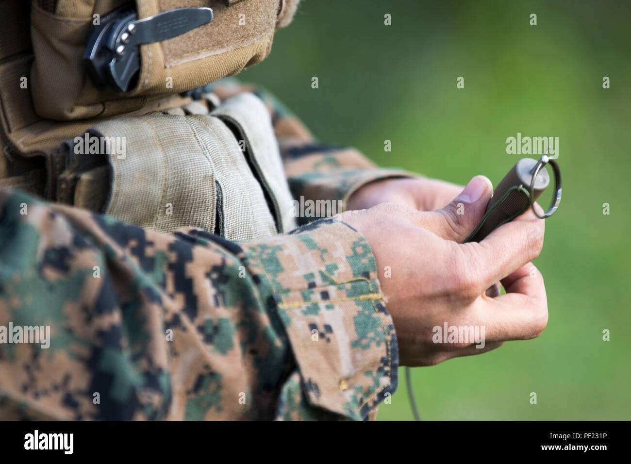 A U.S. Marine Corps Explosive Ordnance Disposal Technician with Special ...
