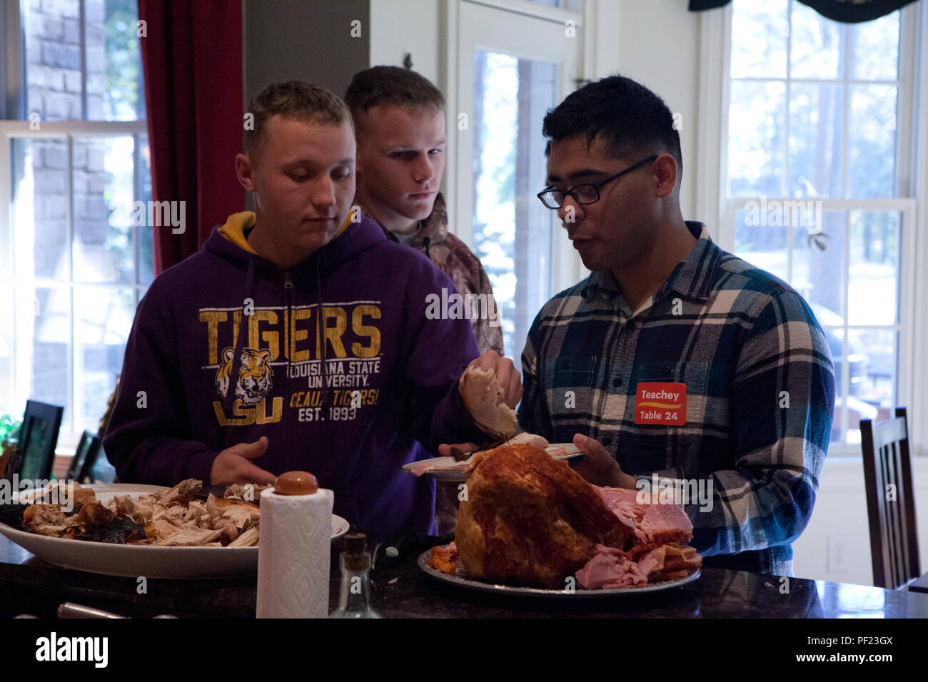 U.S. Marine Corps Pfc.Tyler Bourgeois, left, and Pfc. Bryan Perez ...