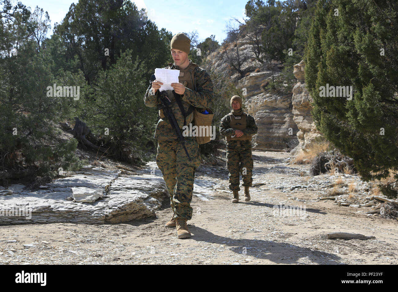U.S. Marine Cpl. Ryan Stevenson, an Intelligence Analyst and U.S. Navy ...