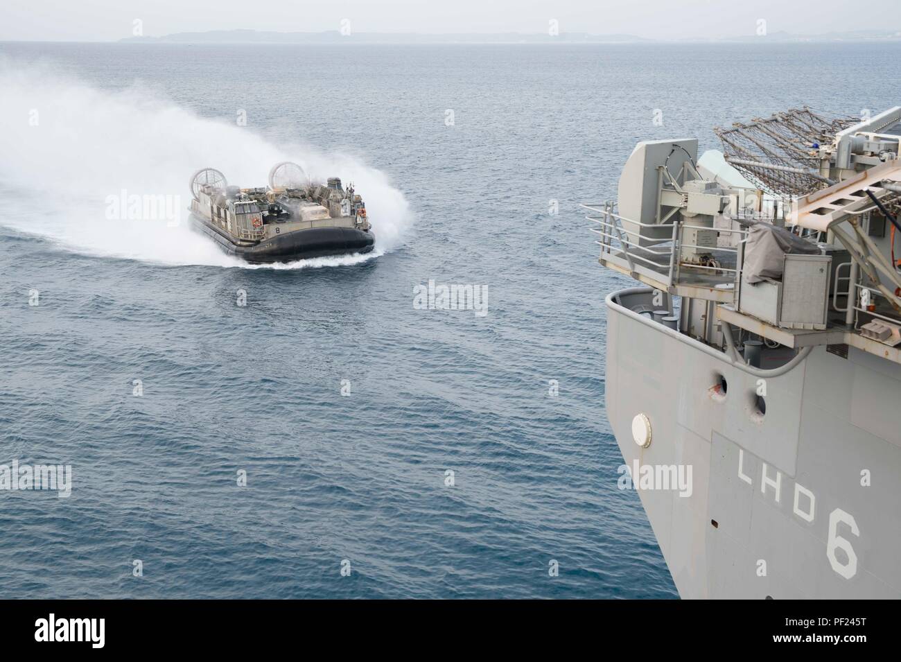 160229-N-XK809-061 WHITE BEACH, Okinawa (Feb. 29, 2016) – Landing craft air cushion 8 (LCAC 8 ...