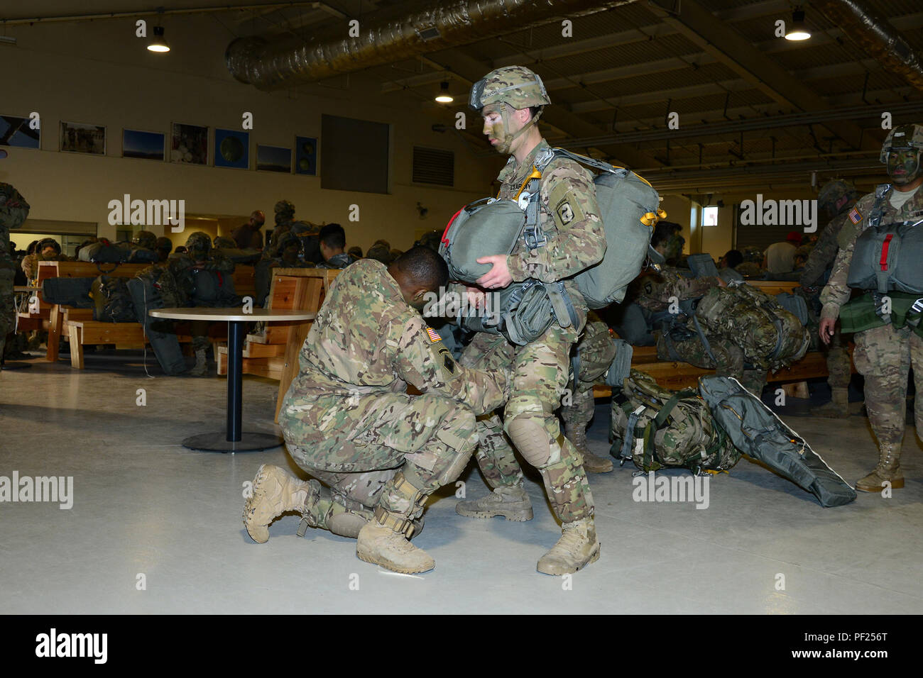 U.S. Army Sgt. 1st Class Tyrone Moses, left, and SSG Jeffrey Popovich ...