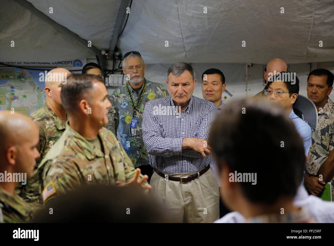 Retired Army Lt. Gen. Karl Eikenberry listens to a briefing at the ...