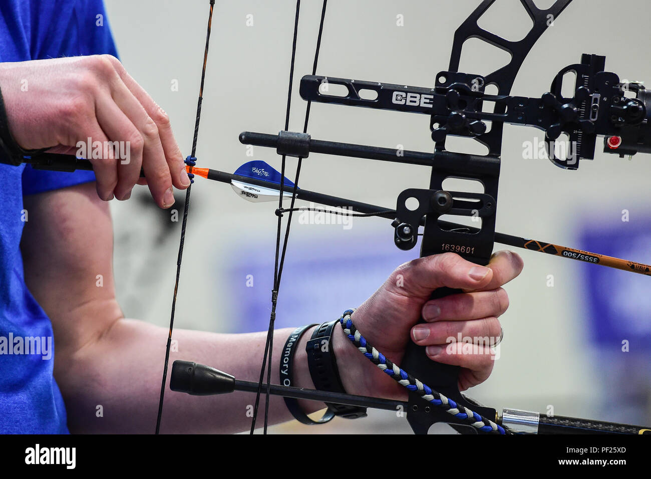 Cal Gentry, Air Force Trials participant, prepares to fire an arrow ...