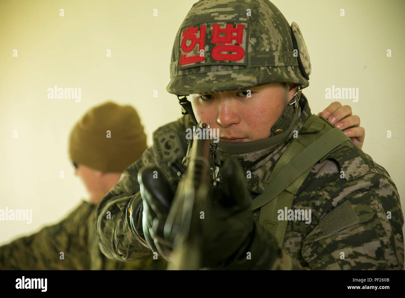 A Republic of Korea Marine leads as “point-man” during urban operations ...
