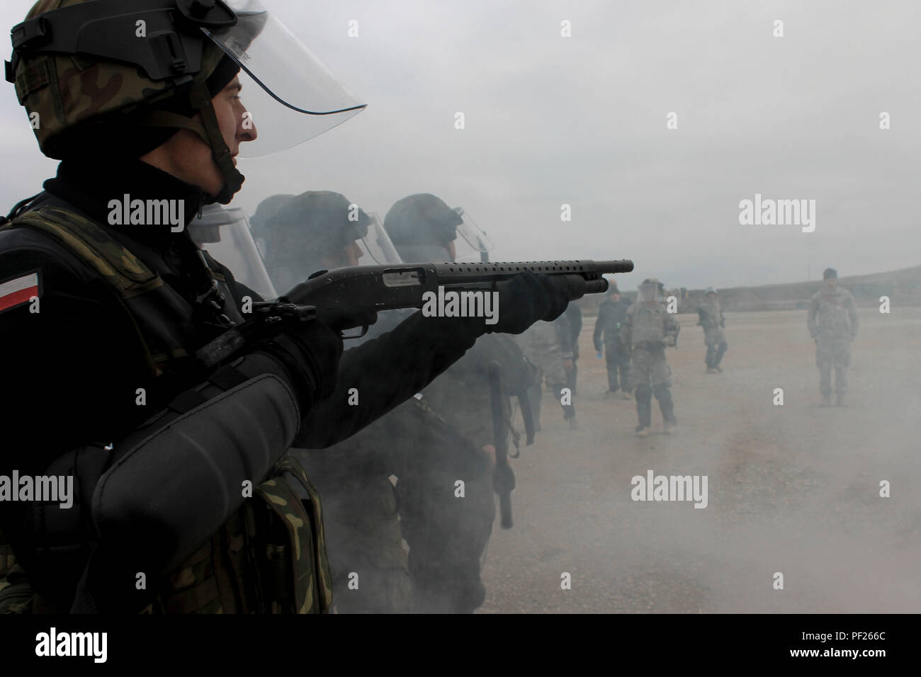 Polish soldiers assigned to the Multinational Battle Group-East Forward ...