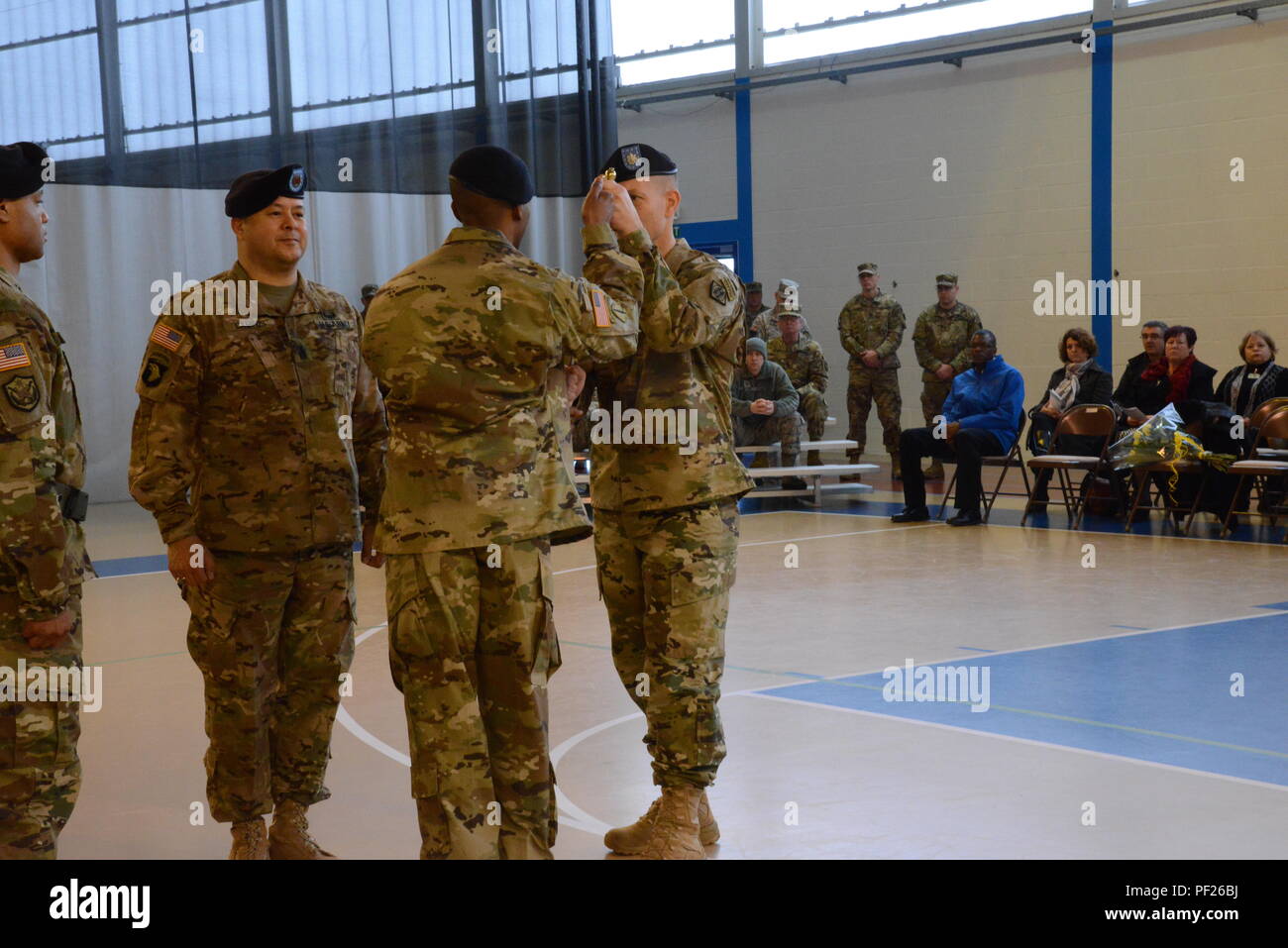 Lt. Col. Eric Van Den Bosh, commander, 39th Signal Battalion, opens the ...