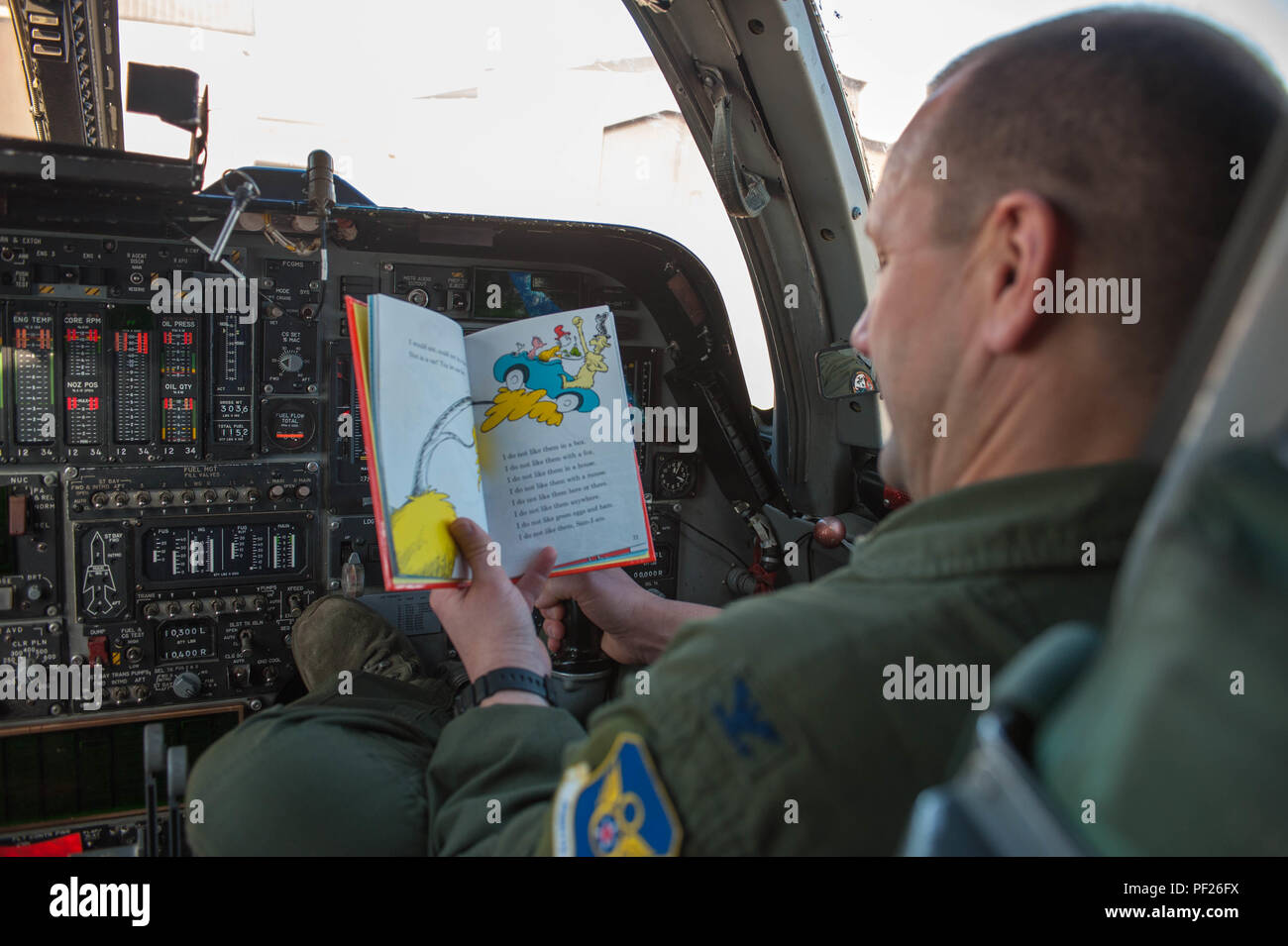 Col. Gentry Boswell, 28th Bomb Wing commander, reads a book in the ...