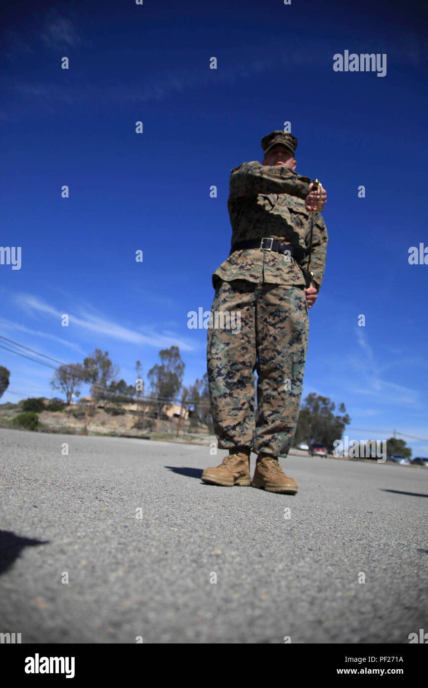 A U.S. Marine practices proper sword manual during Corporals Course on ...