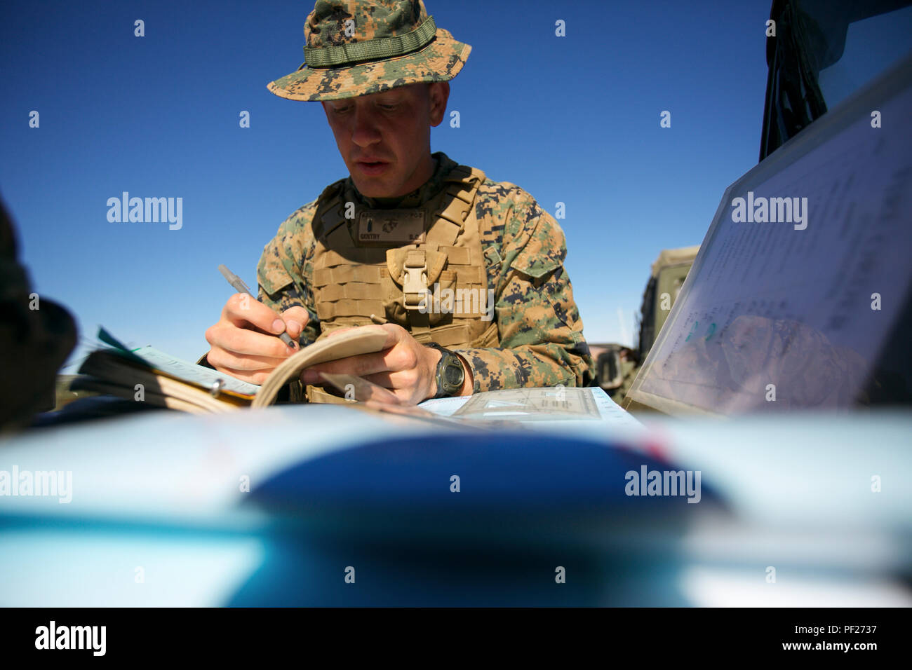 1st Lt. Benjamin Gentry, fire direction officer with Alpha Battery, 1st ...