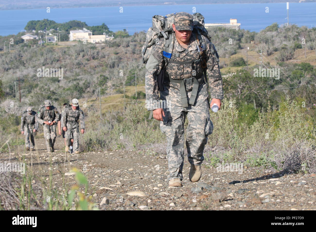 Army Pfc. Jose Niebla, a member of the 525th MP Bn. makes the trek ...