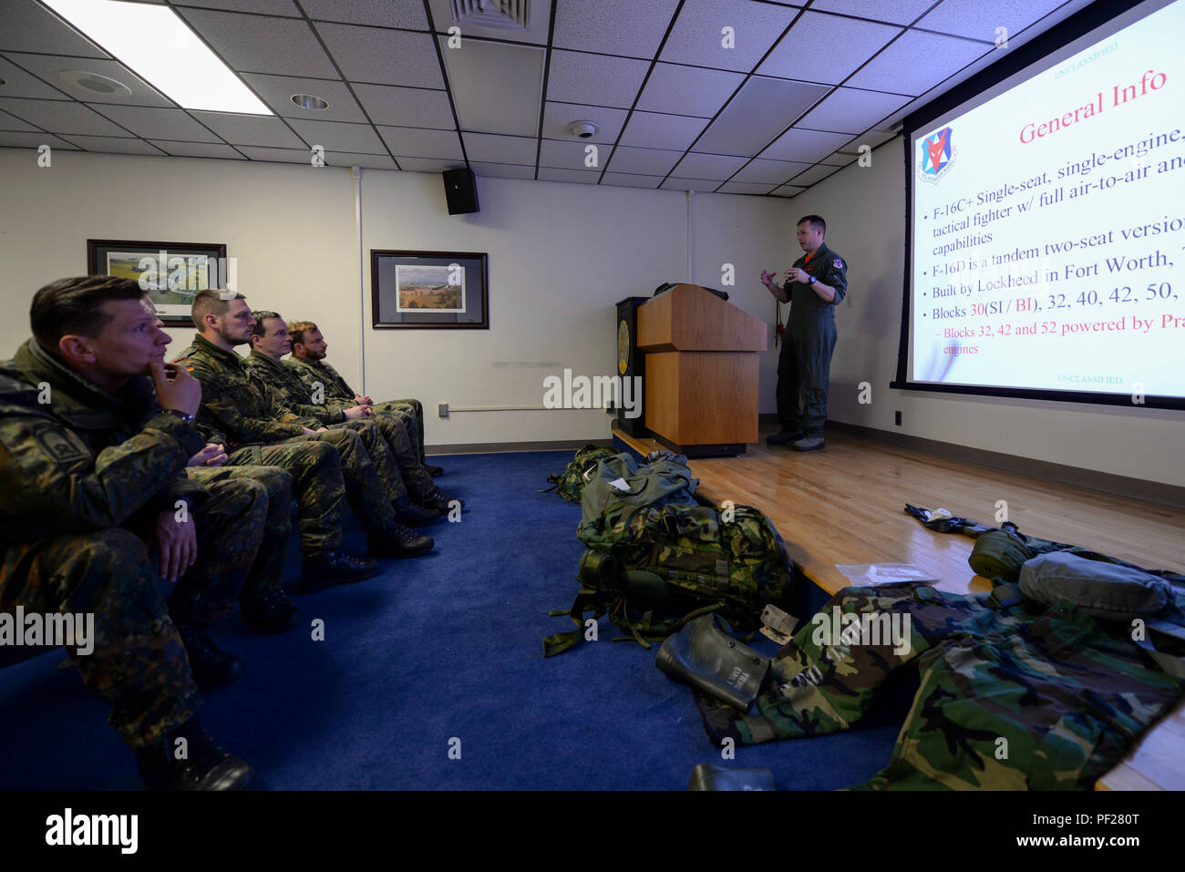 U.S. Air Force Maj. Benjamin Robbins, right, F-16 fighter pilot with ...
