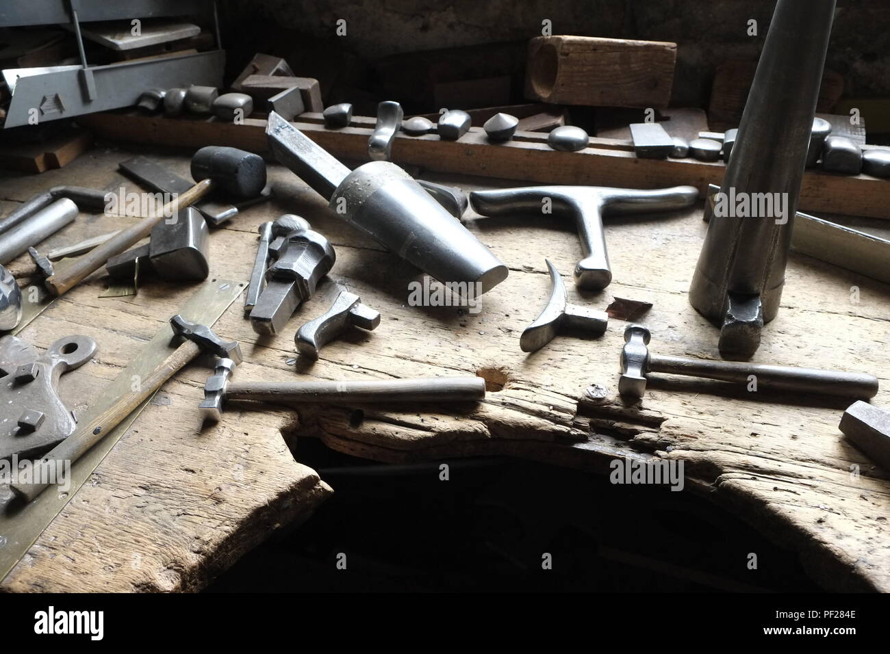 Steel tools for shaping silver in a Cotswold silversmiths Stock Photo ...