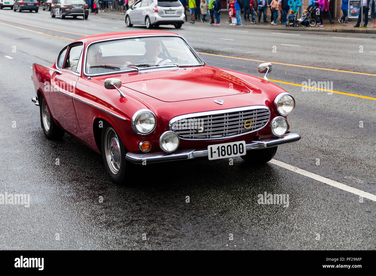 Volvo P 1800, 1967 model. Classic cars parading through the streets in ...