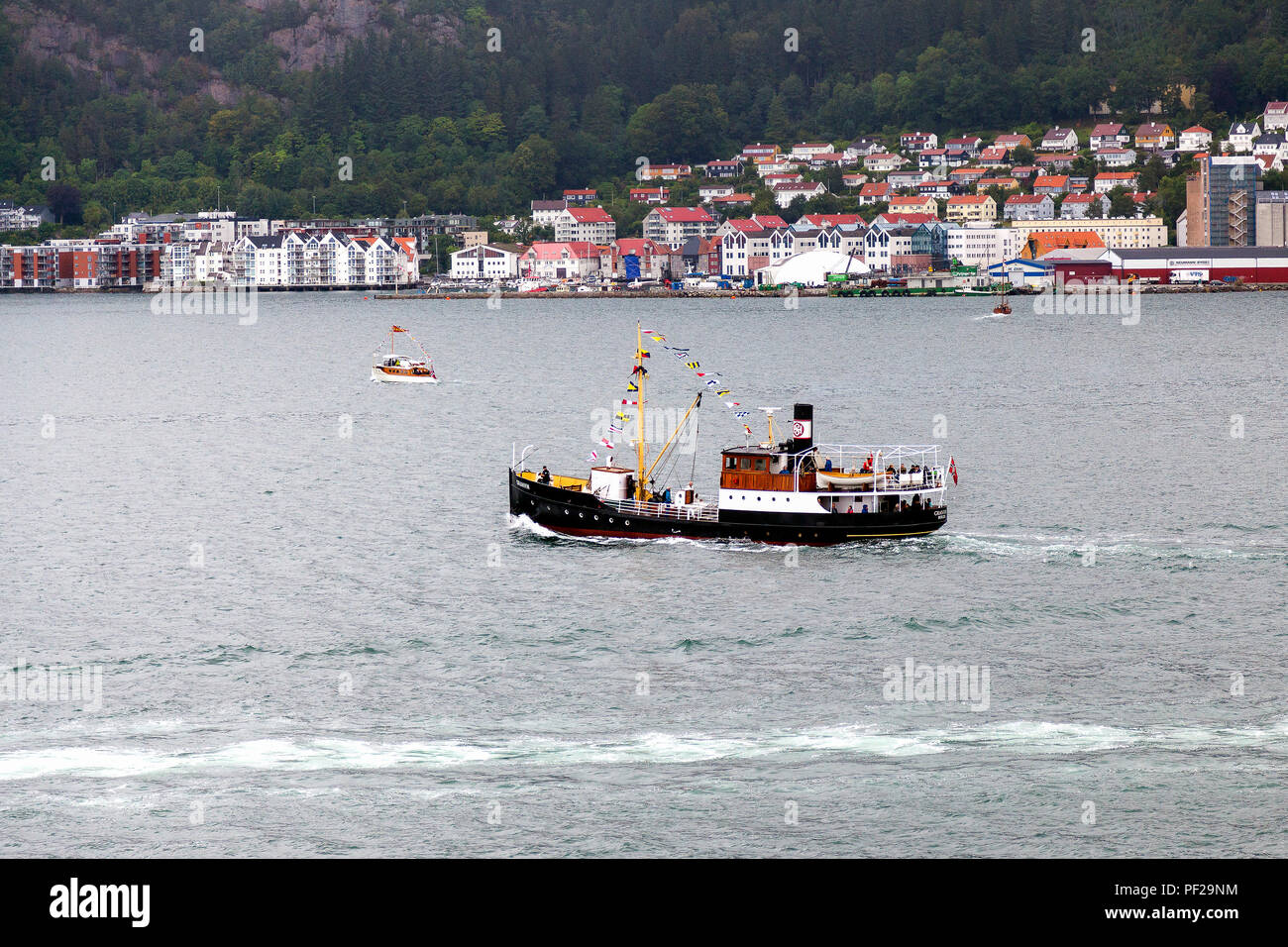 Veteran passenger steamship Granvin (built 1931) sailing from the port ...