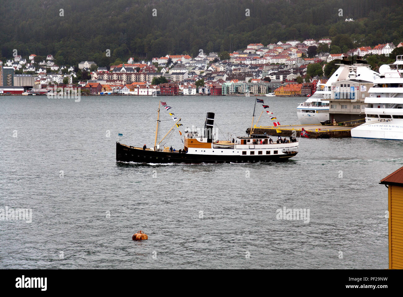 Veteran passenger steamship Oster (built 1908) sailing from the port of ...