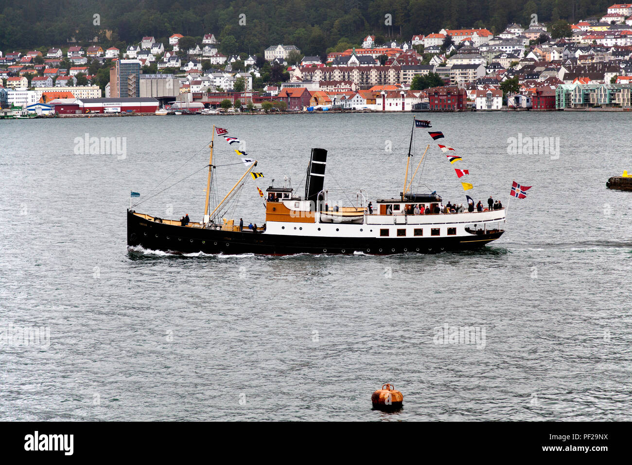 Veteran passenger steamship Oster (built 1908) sailing from the port of ...