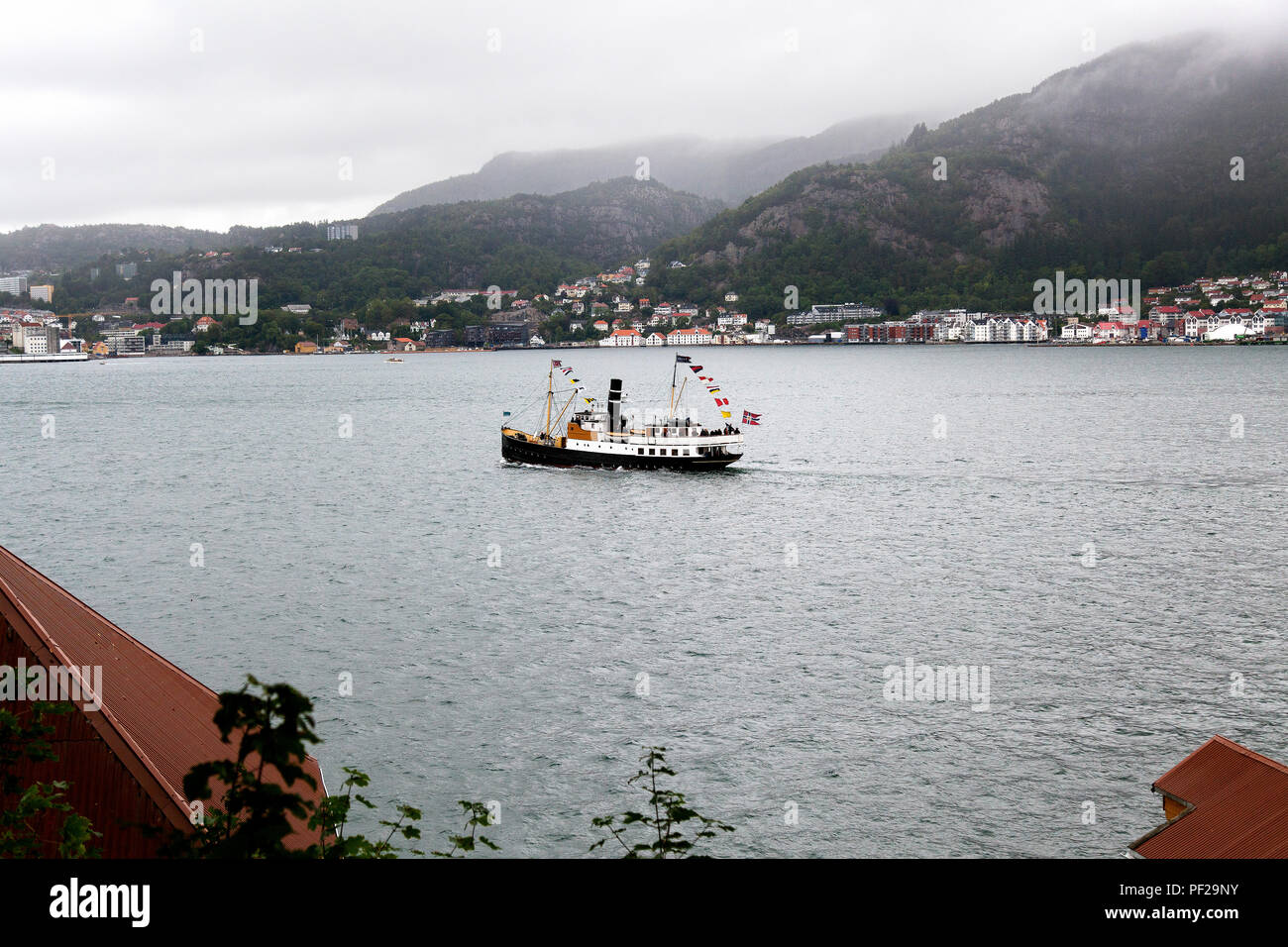 Veteran passenger steamship Oster (built 1908) sailing from the port of ...