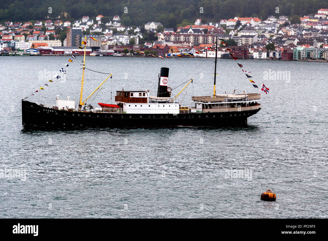 Veteran passenger steamship Stord 1 (built 1913) sailing from the port ...