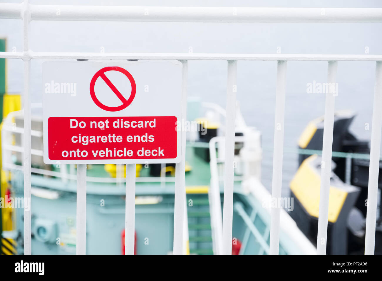 Do Not Discard Cigarette Ends Onto Vehicle Deck On Ferry Ship Stock do-not-discard-cigarette-ends-onto-vehicle-deck-on-ferry-ship-stock