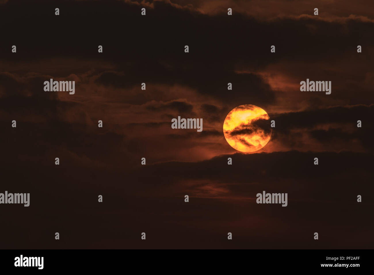 Clouds in front of sun hi-res stock photography and images - Alamy