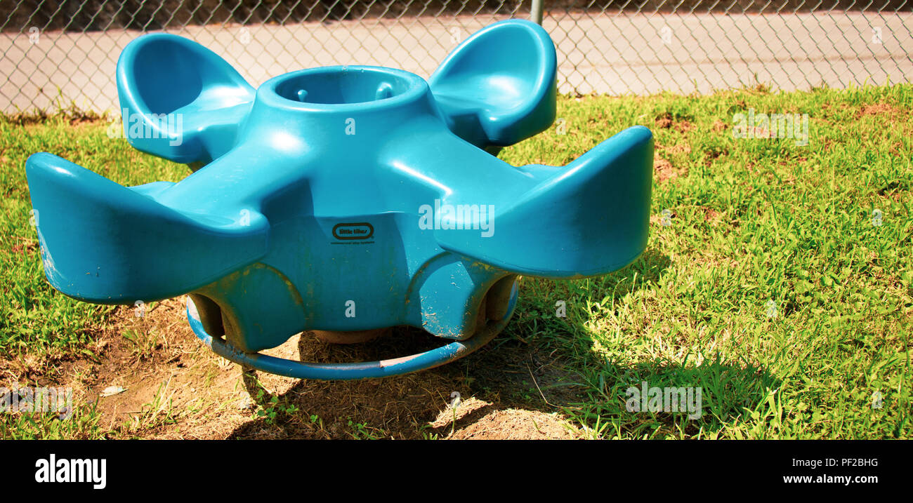 Playground ride hi-res stock photography and images - Alamy