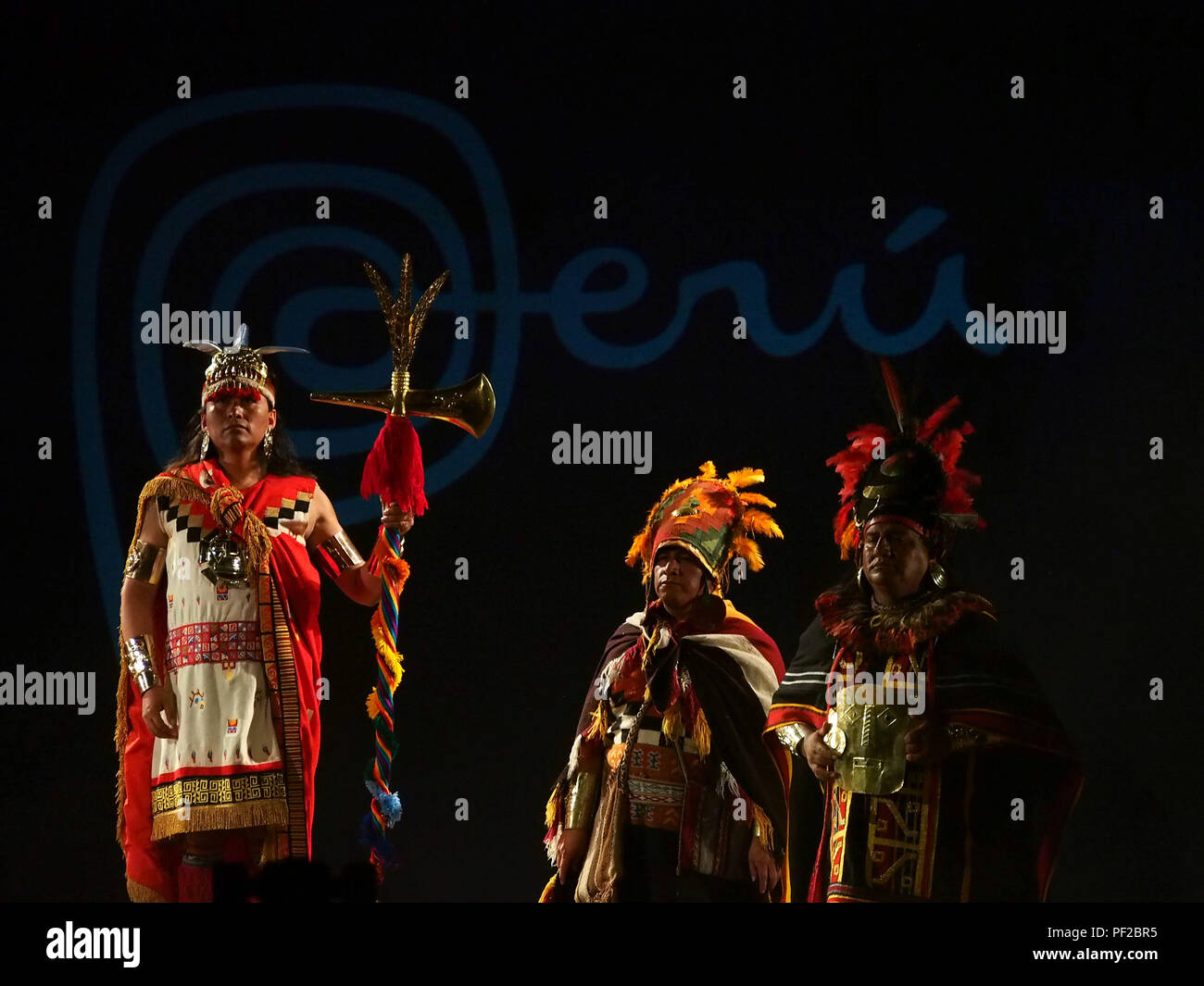 Inca costumed actors, with the Peruvian trade mark in the background ...