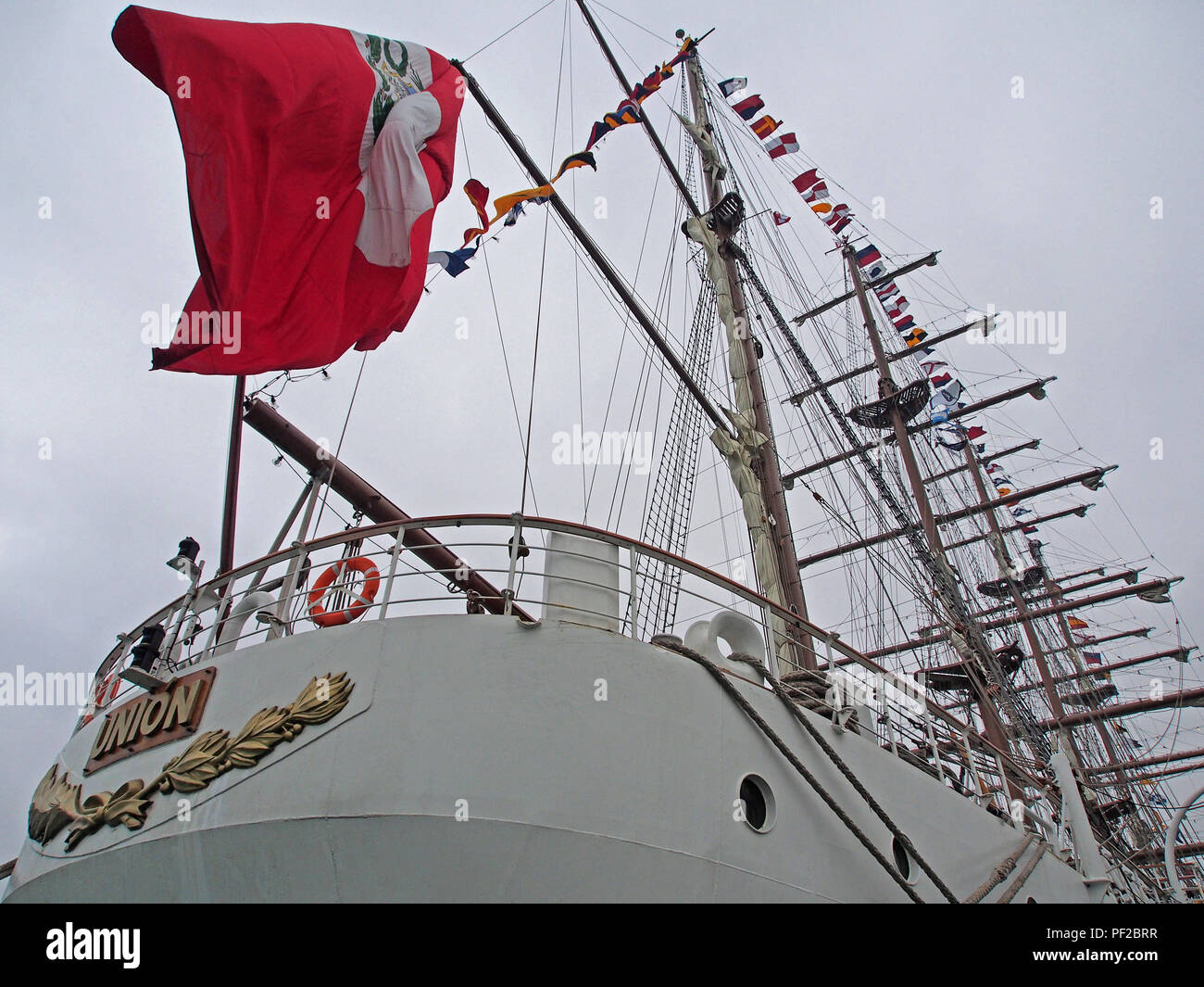 A Peruvian flag waving on stern of the BAP Union sailing ship from Peru ...