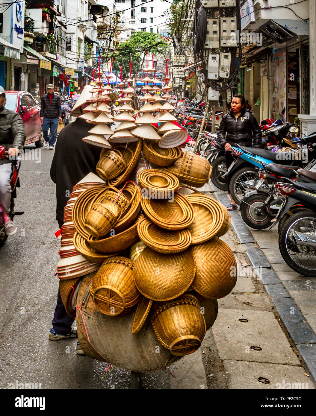 Street in Old Quarter, Hanoi, Vietnam, 3/27/17, Hat vendor on streets ...