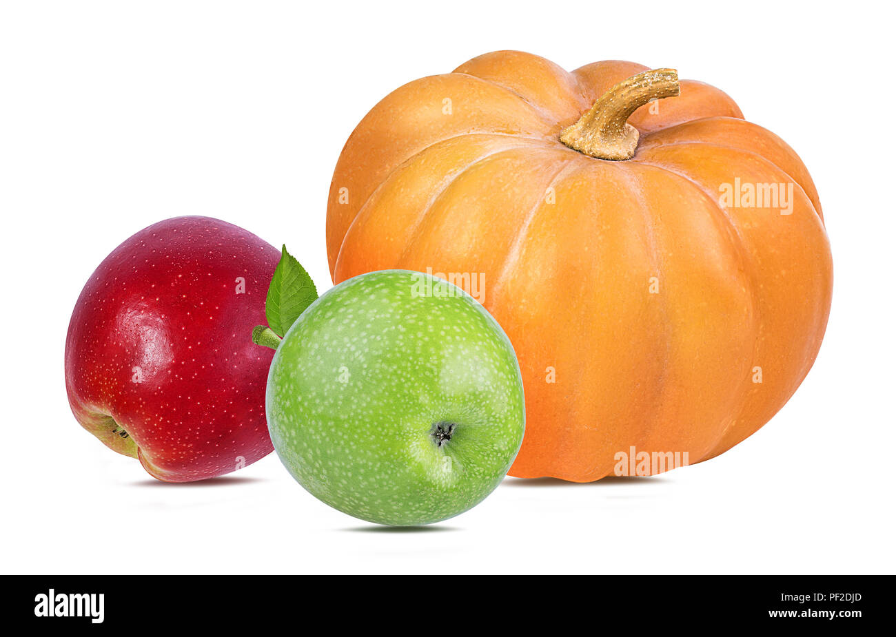 Pumpkins and apple isolated on white background Stock Photo - Alamy